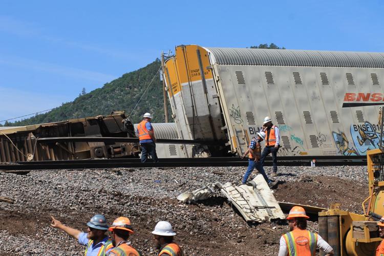 23 freight cars, dozens of new vehicles damaged in BNSF train ...