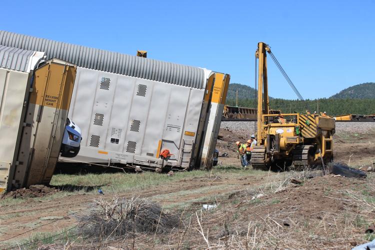 23 freight cars, dozens of new vehicles damaged in BNSF train ...