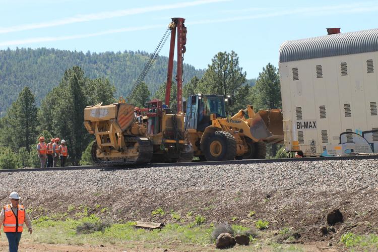 23 freight cars, dozens of new vehicles damaged in BNSF train ...