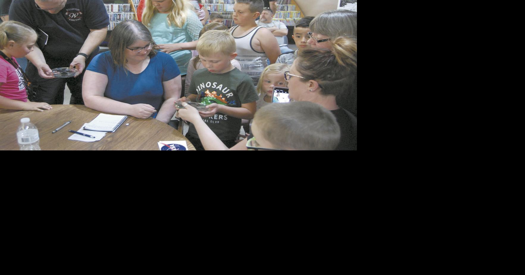 Williston Community Library kicks off Summer Reading with moon rocks ...