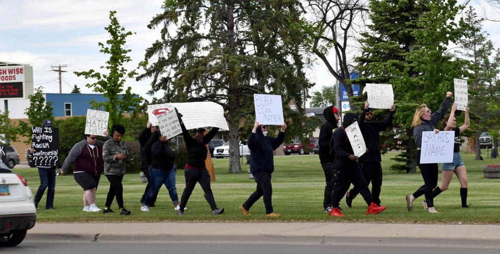 Dozens gather at Harmon Park to protest police violence | Public Safety ...