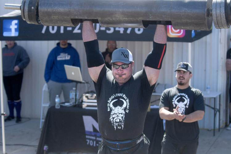 Local gym’s Strongman competition lifts community, raises money for ...