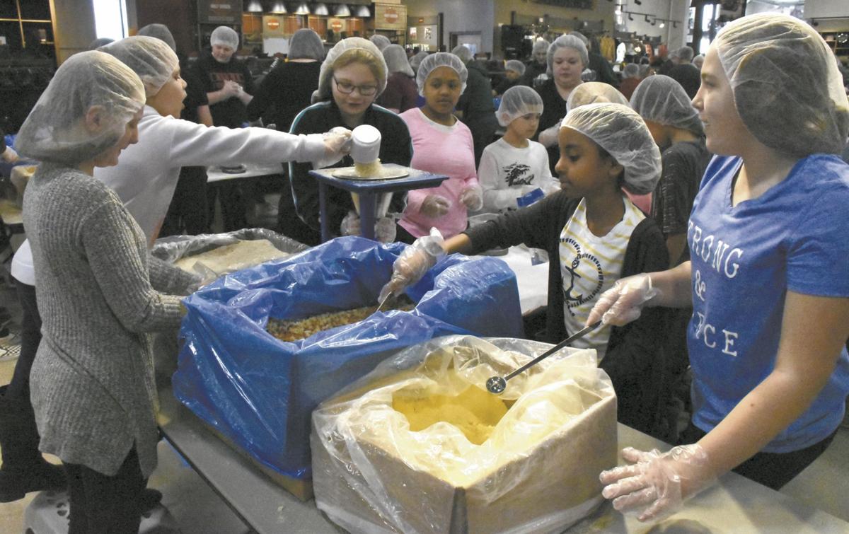 Students give their time to help feed starving children | Education ...