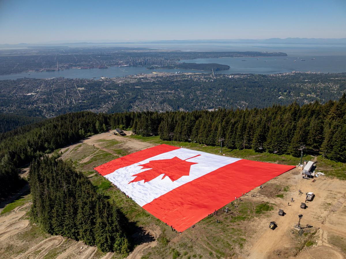 'Biggest Canadian flag' unfurled in Vancouver for World Cup, but may ...