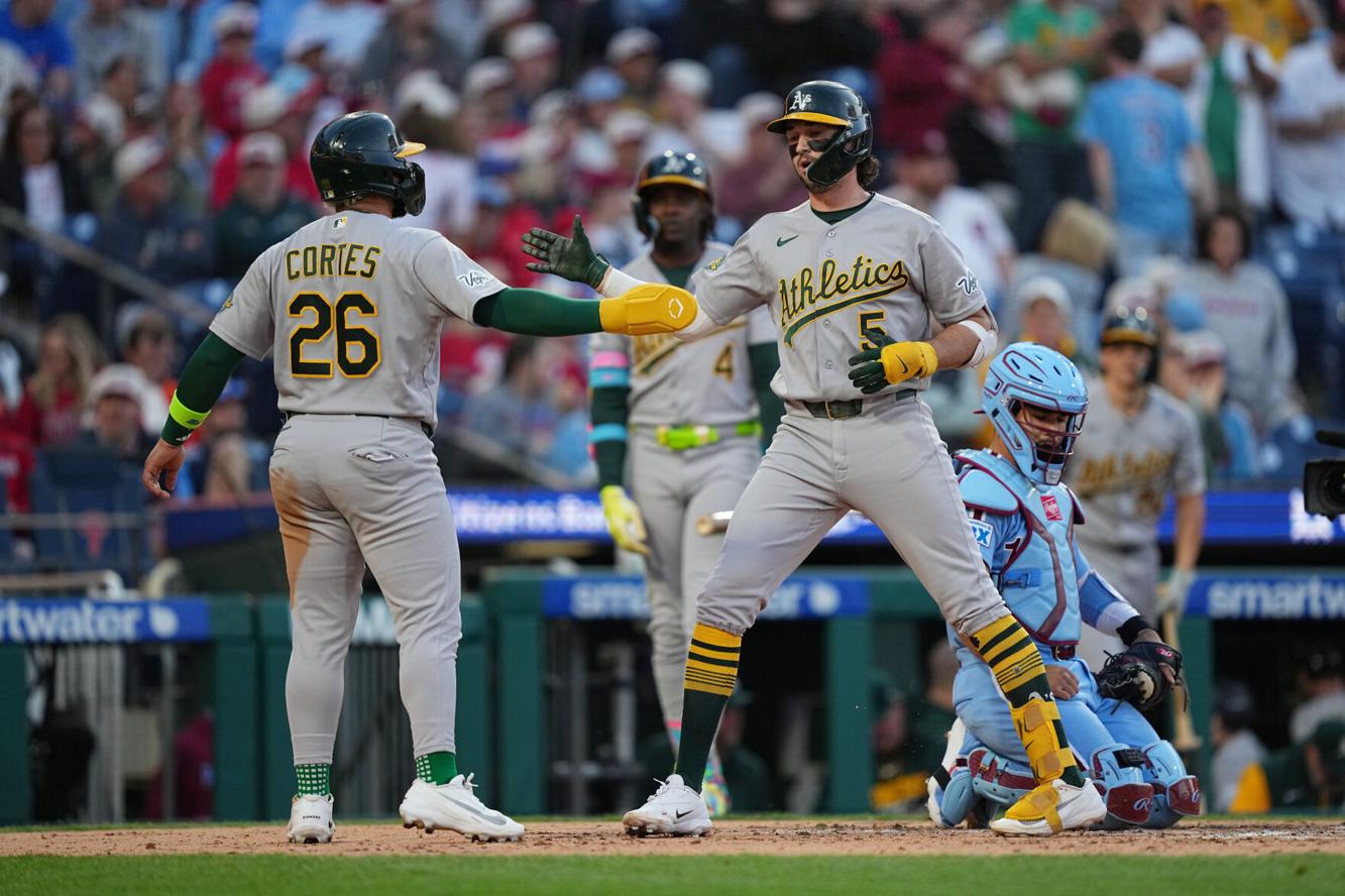 Ginn goes 8 innings and Gelof hits one of four A's homers in 12-1 rout ...