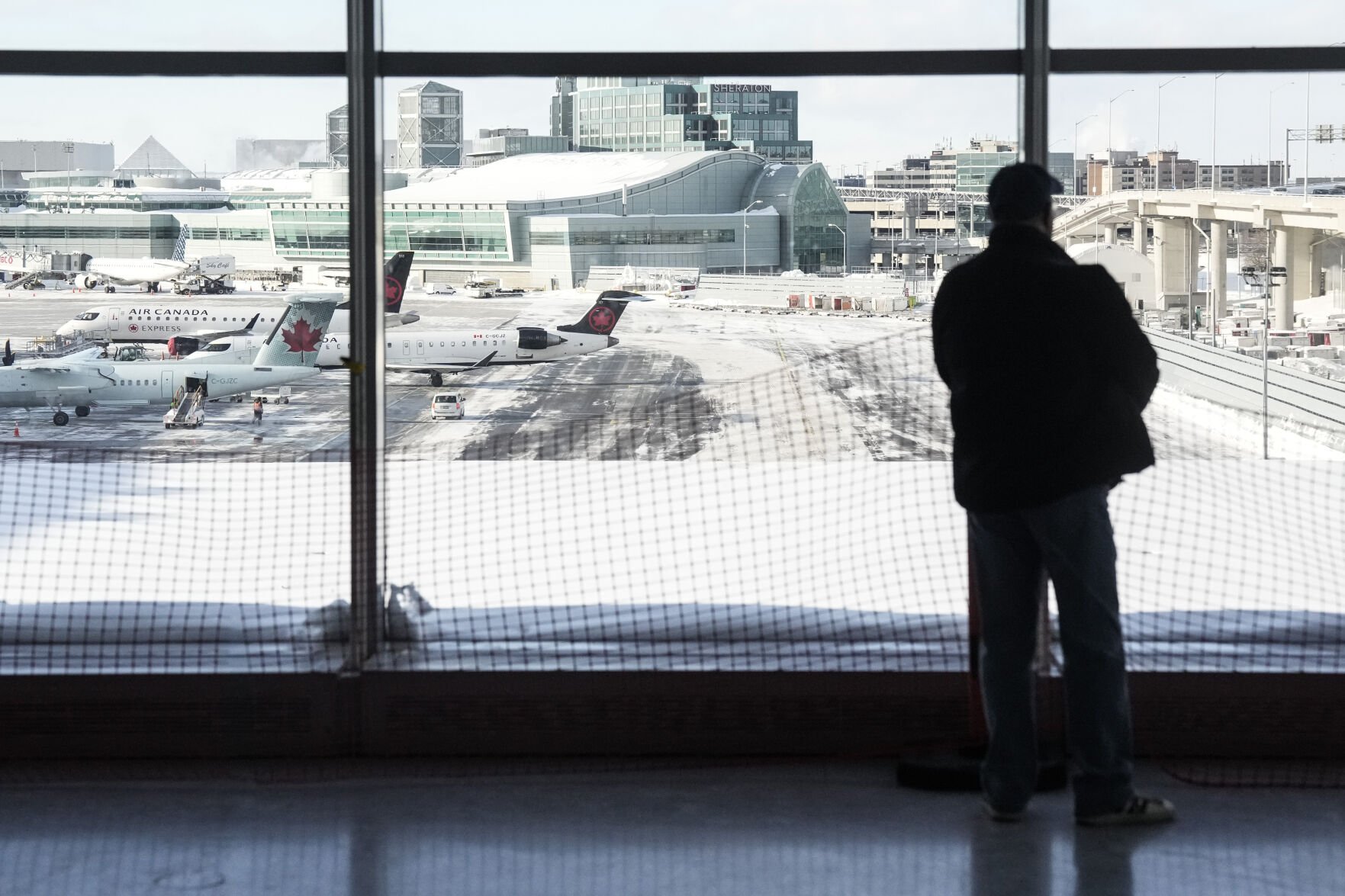 Air travel recovery ramps up after snow blast, but thousands still face ...