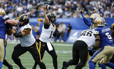 Mitchell tosses three TDs in Ticats' 37-27 win over Blue Bombers ...