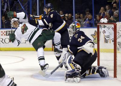 Backes, Blues top Wild in OT