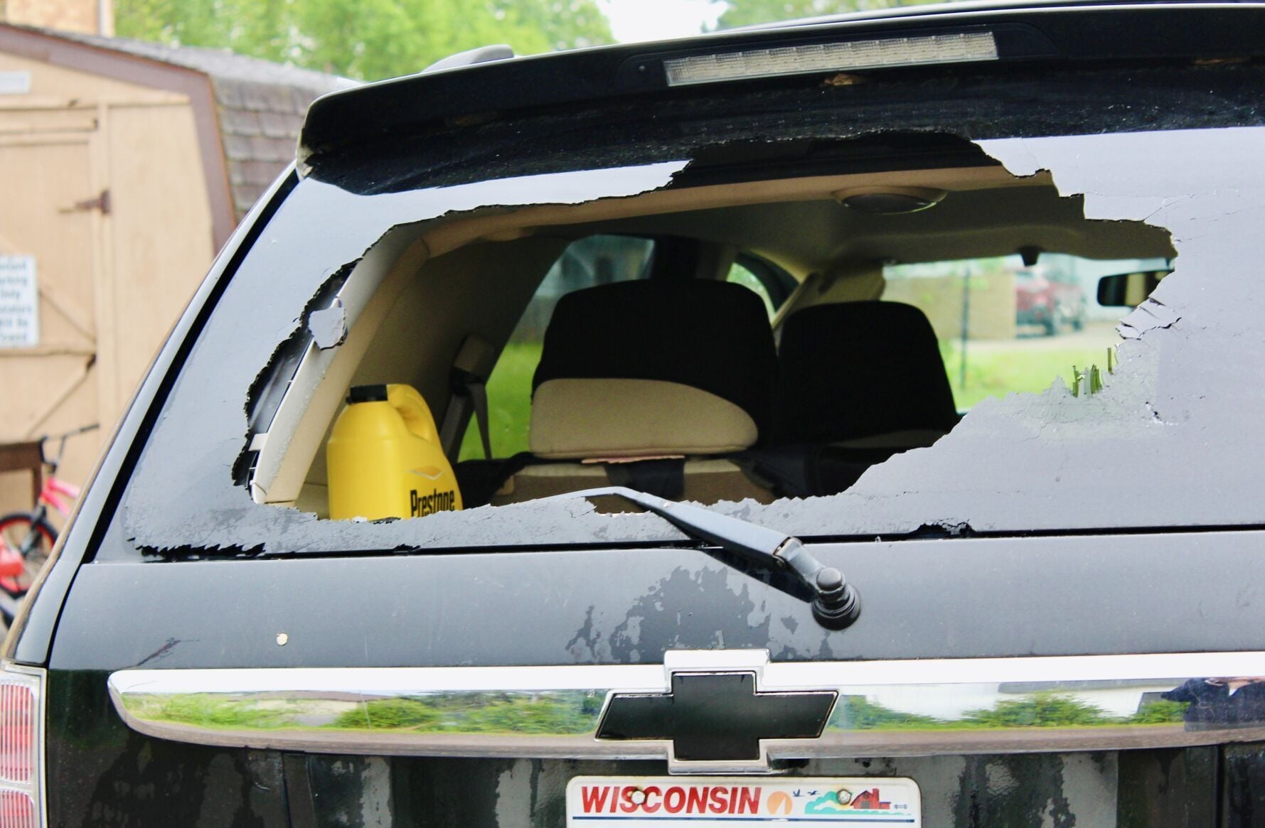 IN PHOTOS: Large hail knocks out windows, damages vehicles in Eau Claire