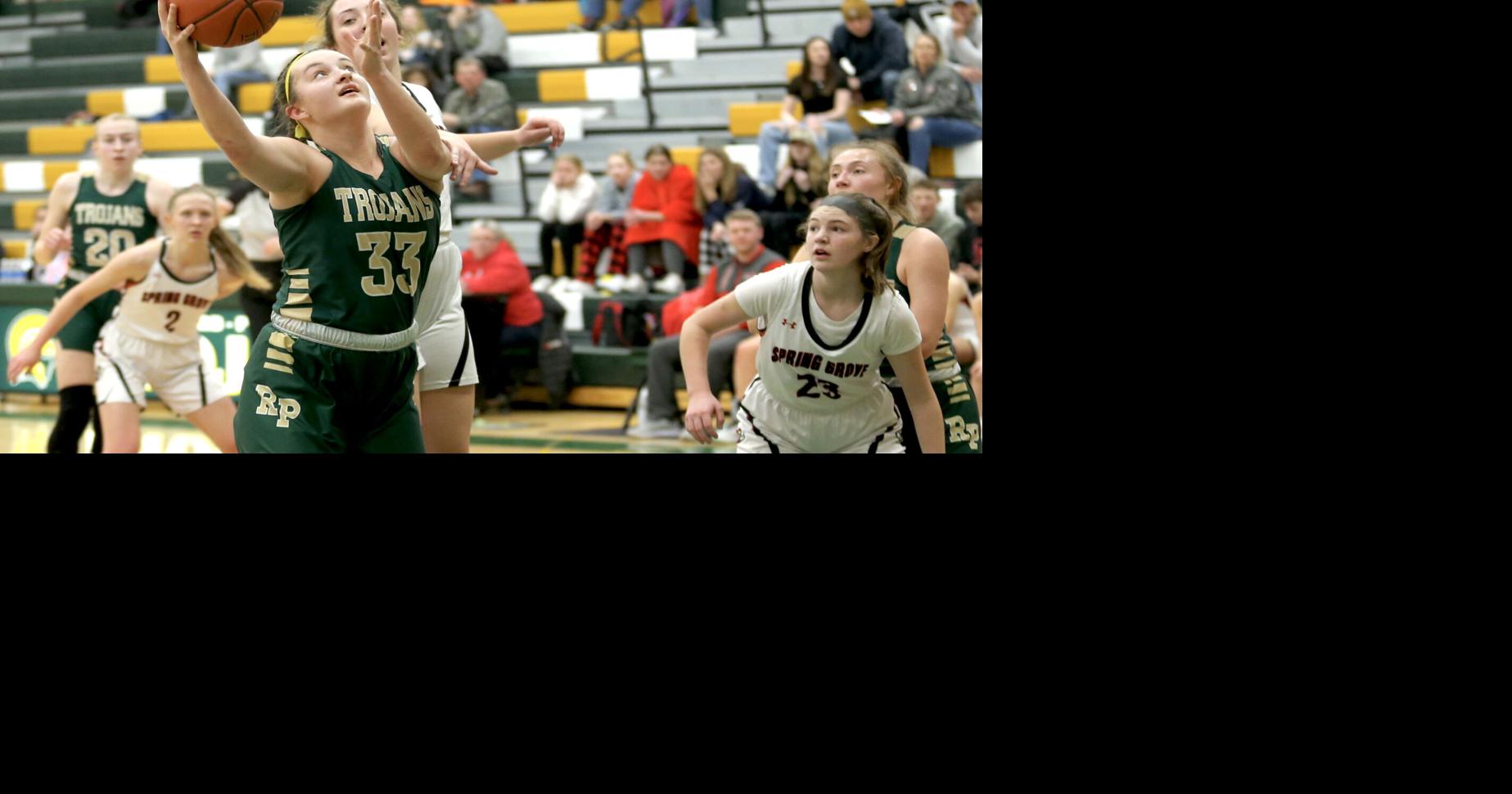 High school basketball: Trojans comeback for first playoff win since 2019