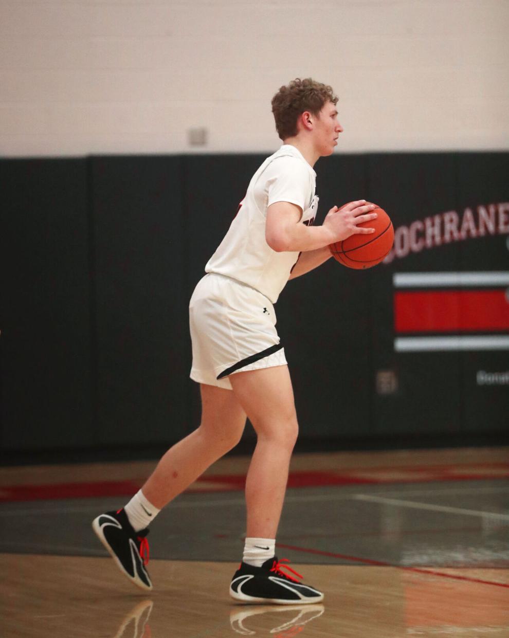 Photos: Cochrane-Fountain City boys basketball advances in playoffs