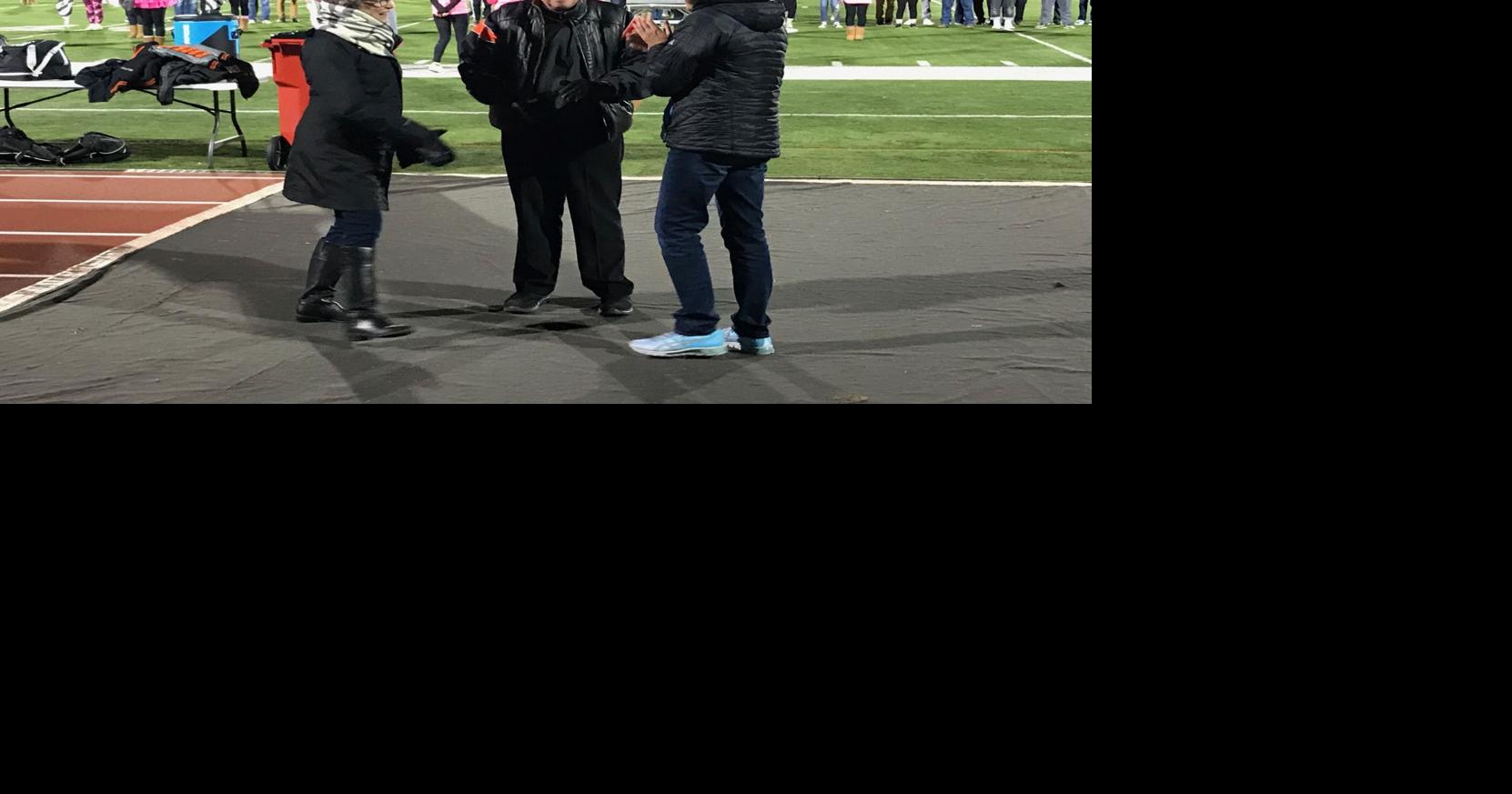 Rep. Gene Pelowski honored at halftime of football game