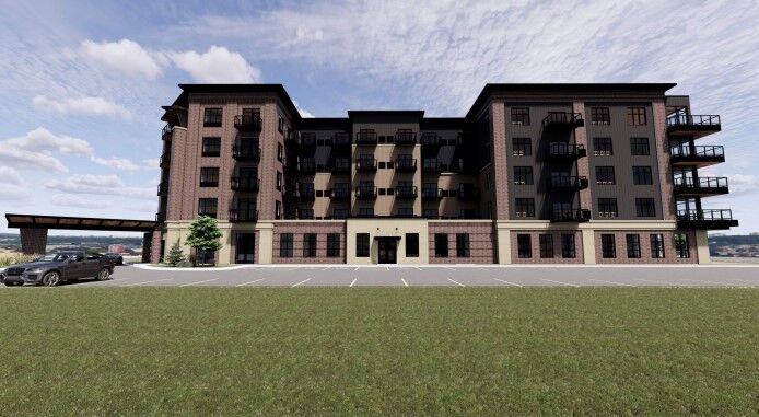 Winona's downtown hotel, housing project begins construction