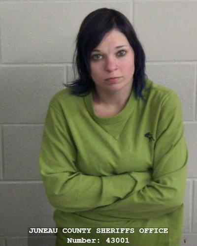 2 charged after body burned in rural Juneau County