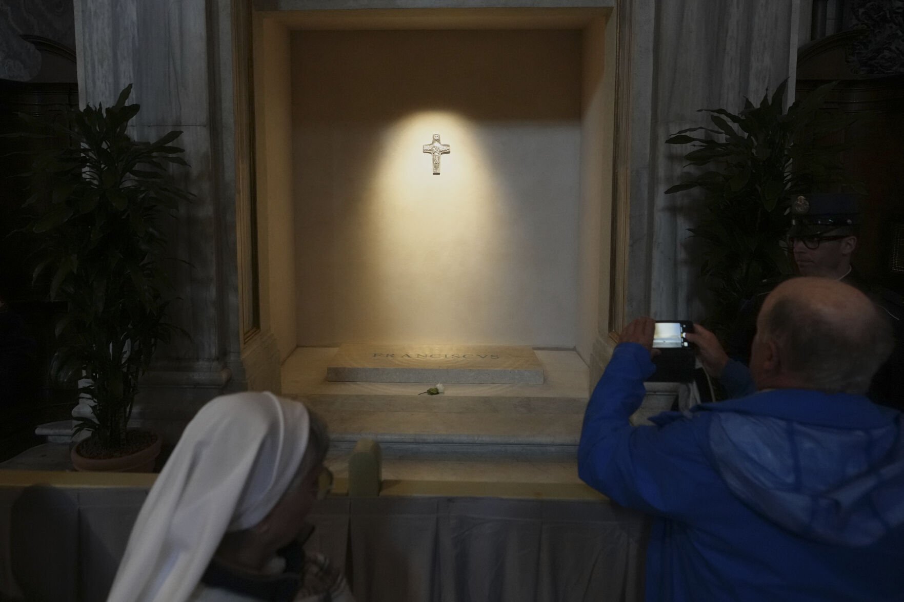 Catholics pay respects as pope's tomb opens to public