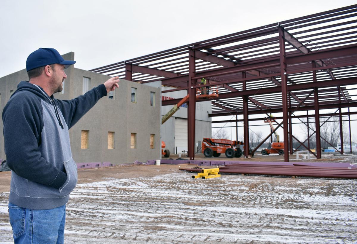 Man treated for minor injuries after small fire inside Wieser Concrete ...