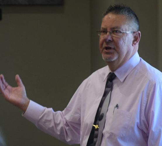 County honors four retiring employees