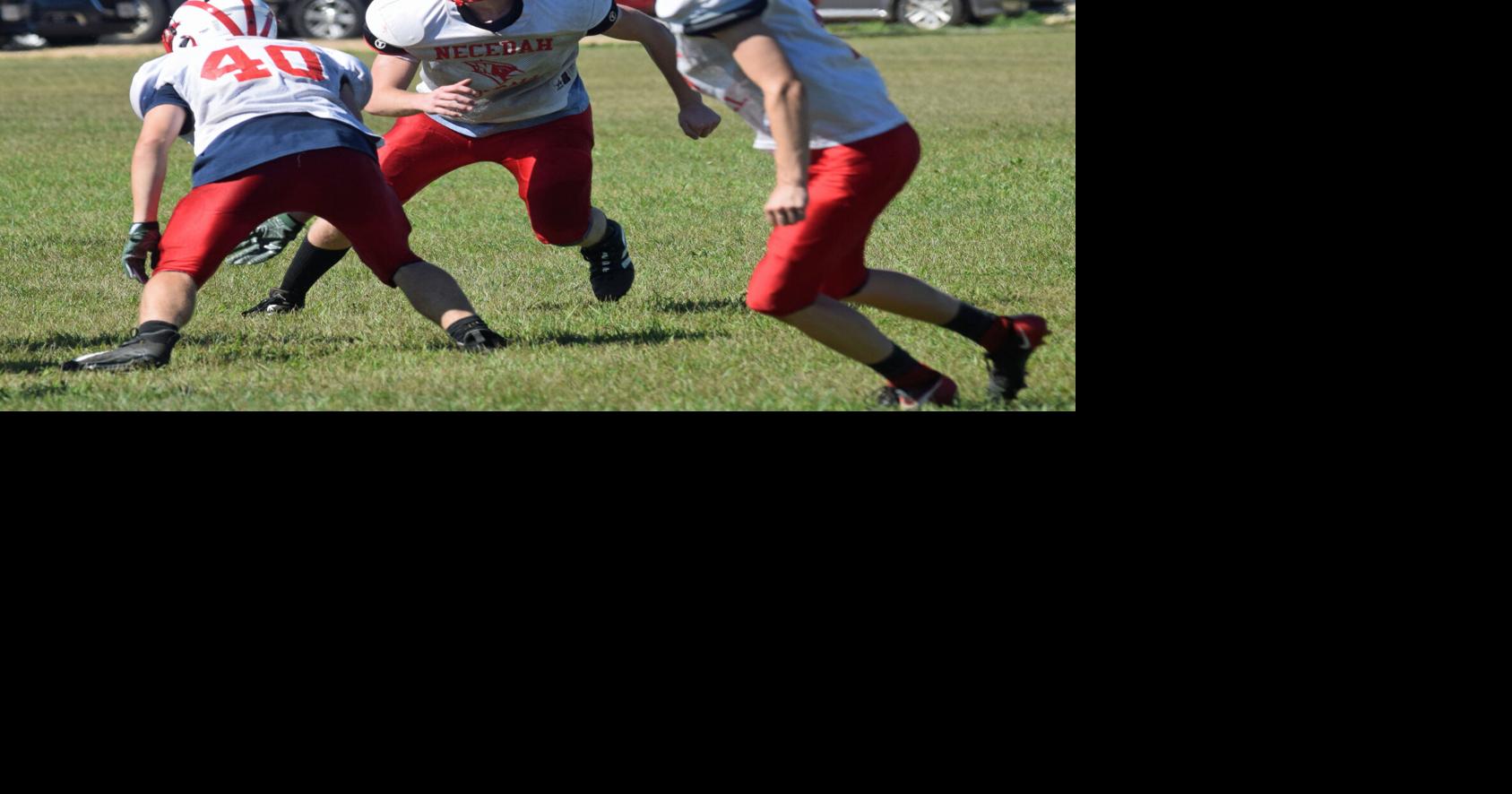 Photos: Action of the Necedah football team getting ready to take off ...