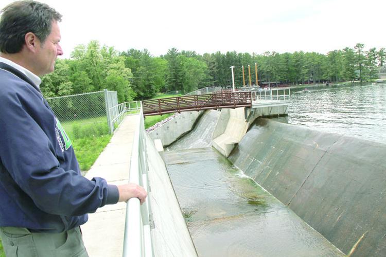 Five years after breach, dam will withstand floods