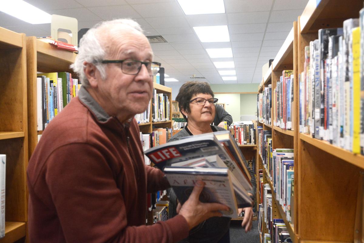 Volunteers give Rio library a boost in its 100th year