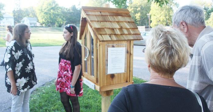 Scout brings a Little Library to Merrimac