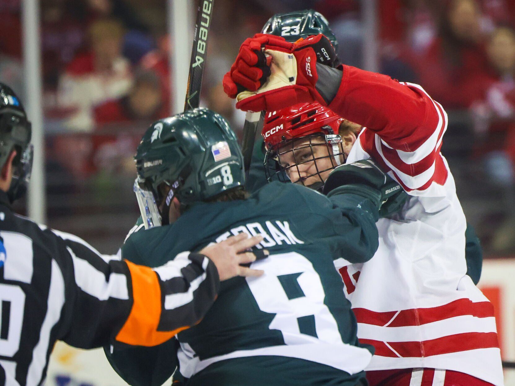 Photos: Wisconsin hosts Michigan State to open key Big Ten men's hockey ...