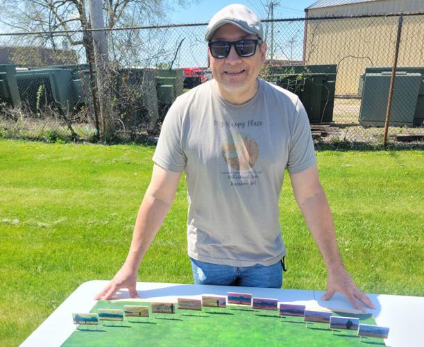 Area artist Chris Sweet creating mural for Great Sauk Trail