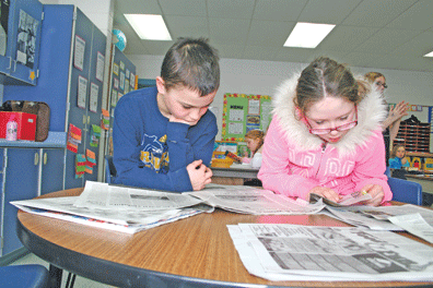 Reading newspapers opens windows to community