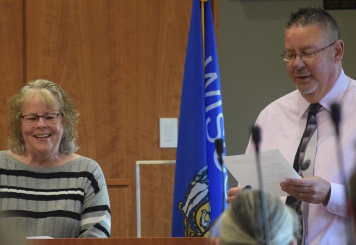 County honors four retiring employees
