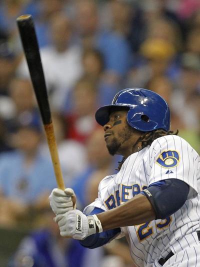 Weeks homers for rare Brewer win over Reds