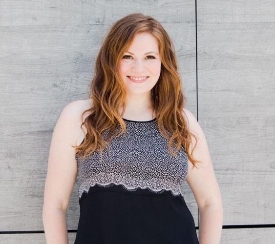 Big-city author not far from being that small town Portage girl