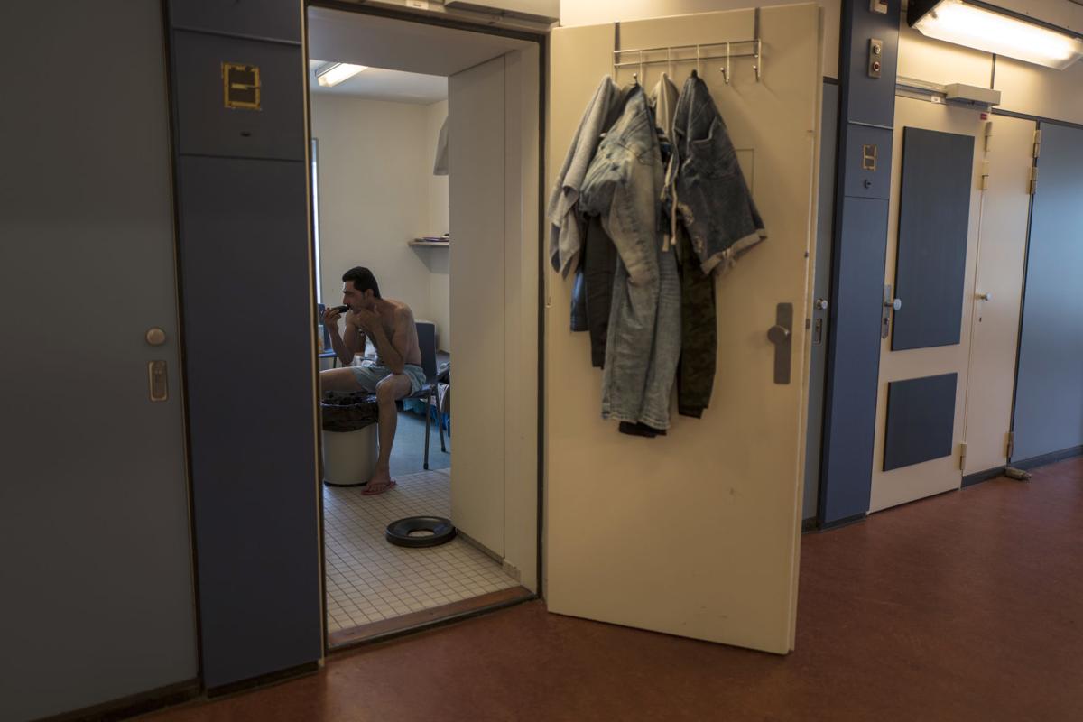 Photos: Old prison becomes new home for refugees in Netherlands | World ...