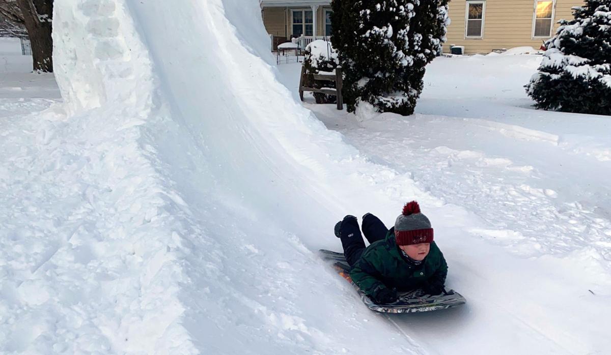 Fall River man brings neighborhood together with sledding hill in his yard
