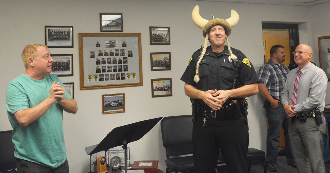 Portage PD celebrates two officers' 20 years on force