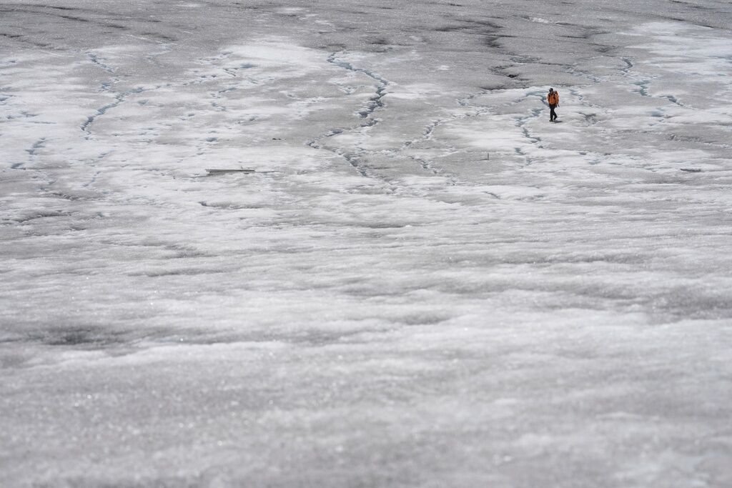 See photos of a Swiss glacier melting in the heat of climate change