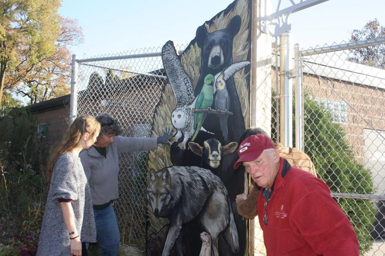 Area painter has mural featured at Ochsner Park Zoo entrance