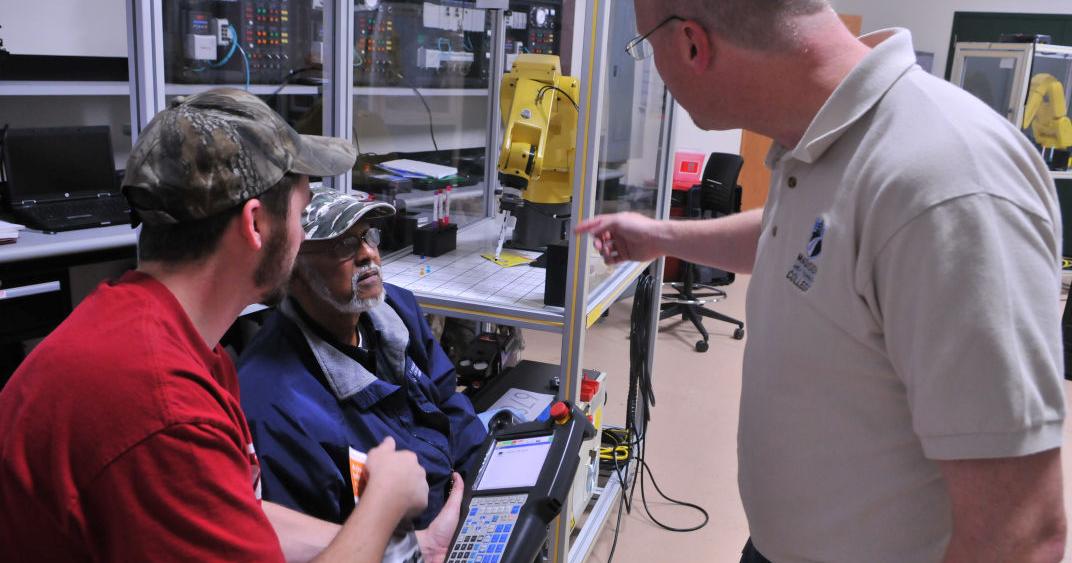 Employees of local industrial companies finish MATC robotics class at ...