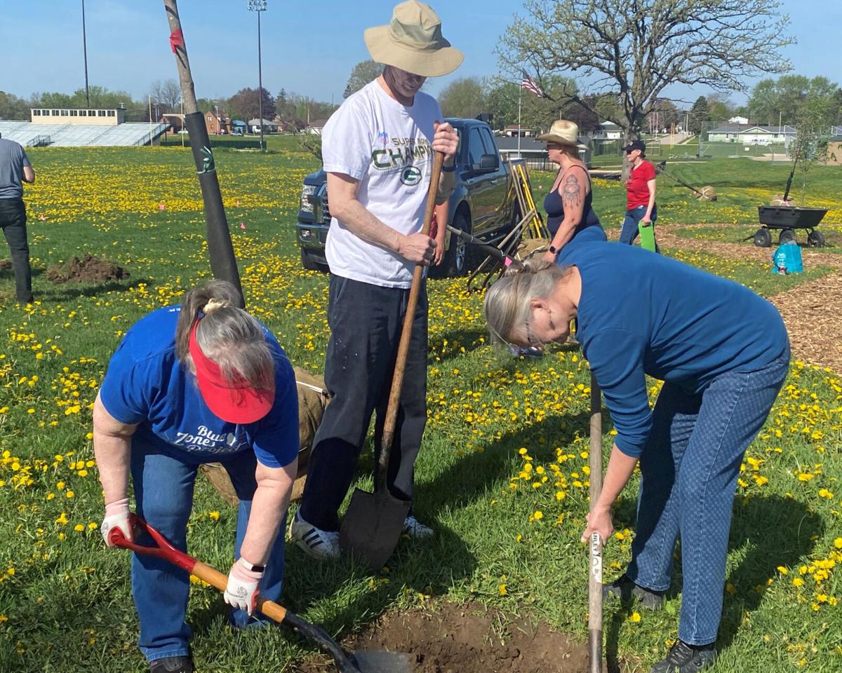 Beaver Dam High School class of '72 plants trees in school forest