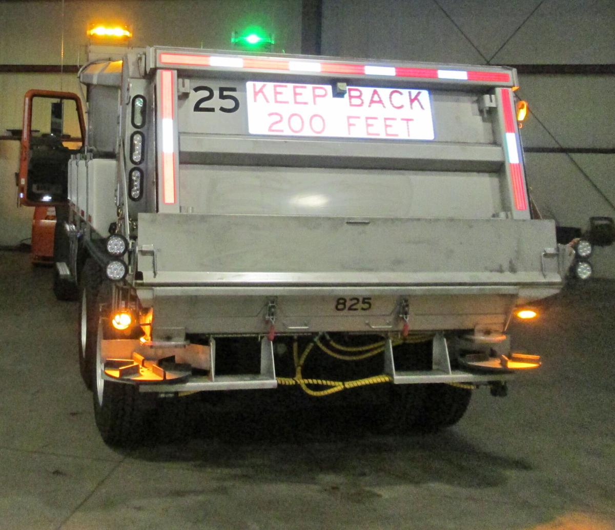 Highway maintenance trucks switch to green lighting