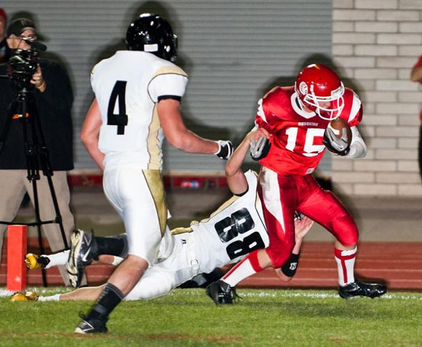 Defense keys Redskins' 18-8 win over rival Elks - A photo gallery ...