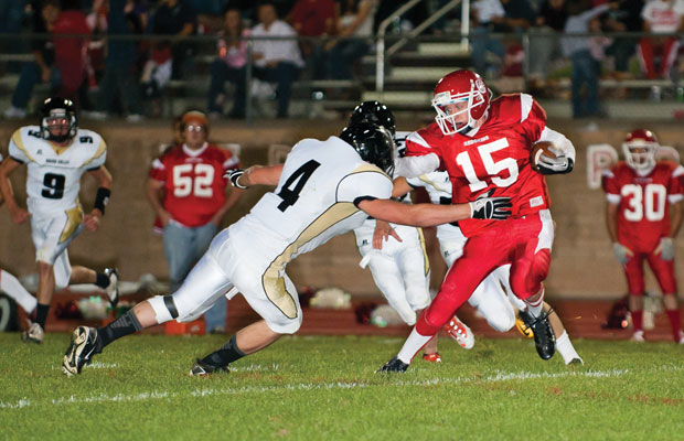 Defense keys Redskins' 18-8 win over rival Elks - A photo gallery ...