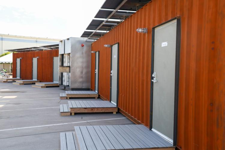 Repurposed shipping containers provide shelter for those experiencing ...