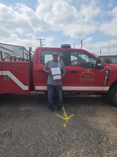 Invenergy donation to Sharon Fire Department | | woodwardnews.net
