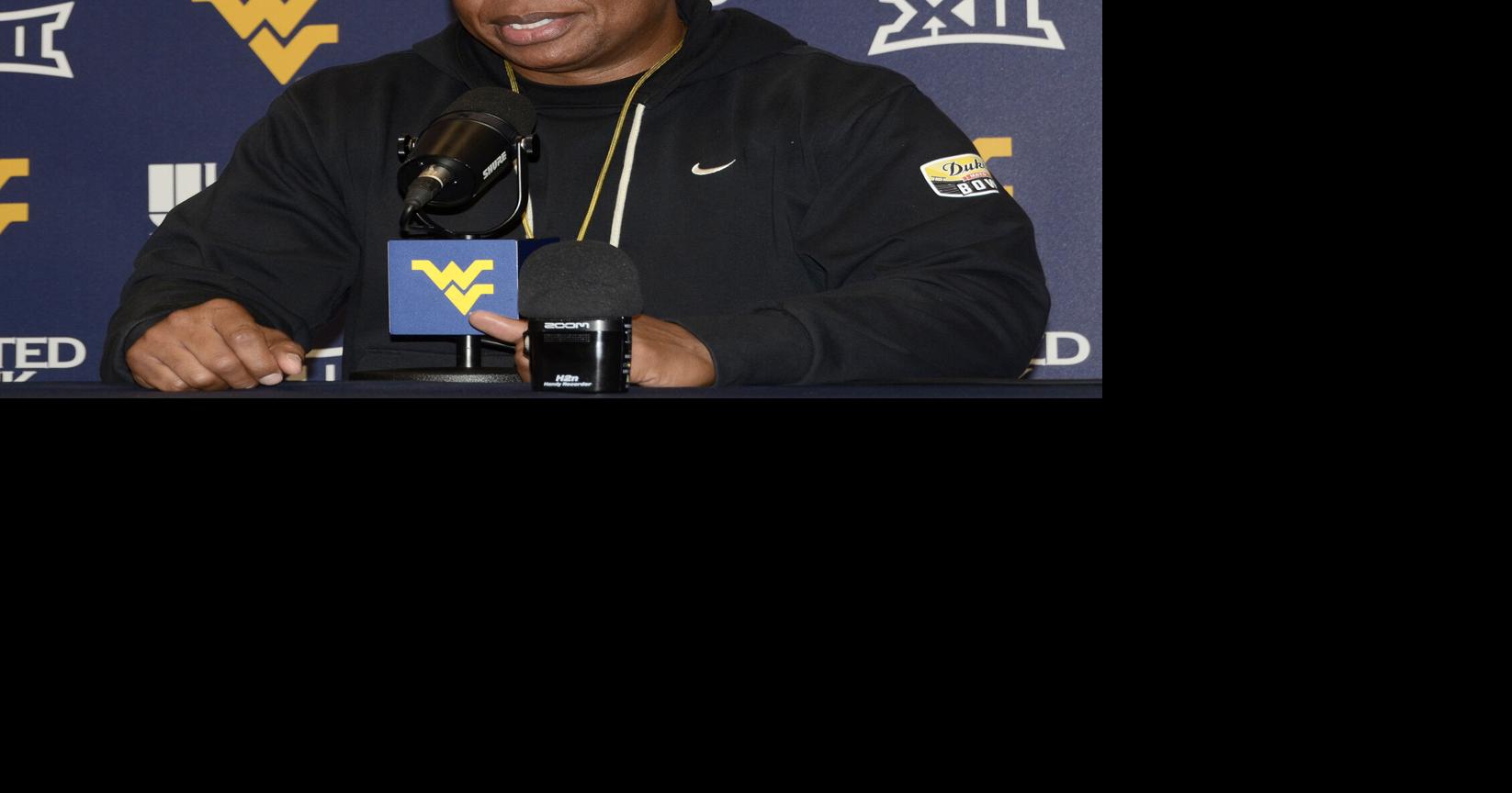 WVU begins spring football practice with 18 newcomers trying to learn ...