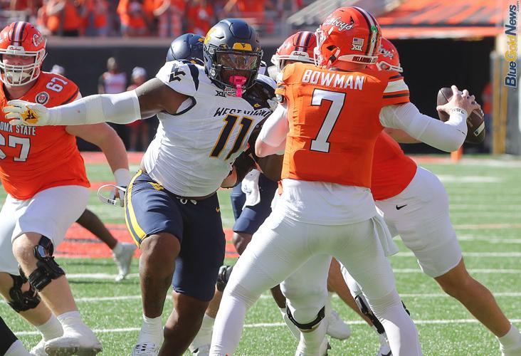 West Virginia steamrolls Oklahoma State, 38-14, behind impressive ...