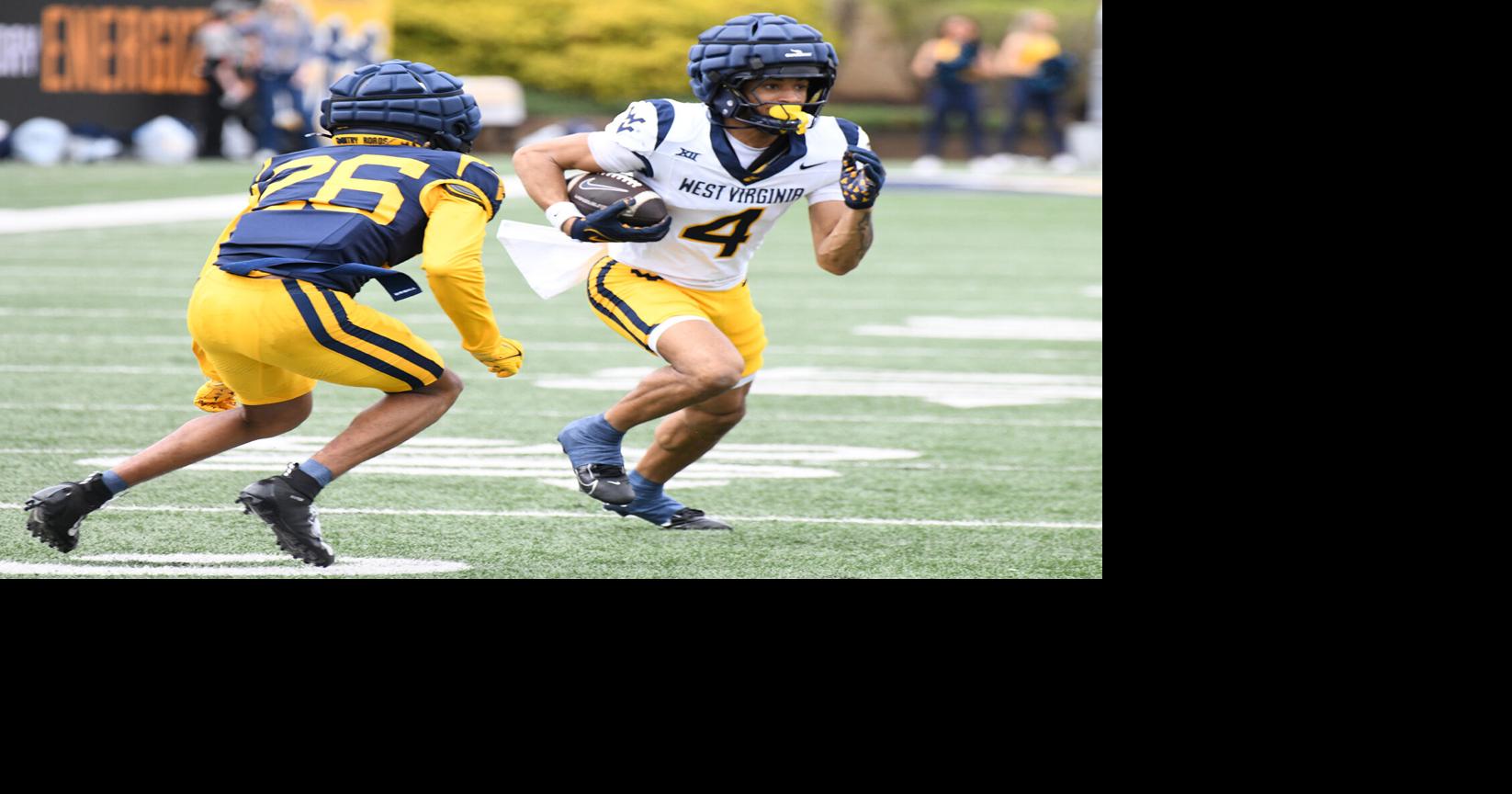WVU football Cam Vaughn past Jason Cross front | West Virginia ...