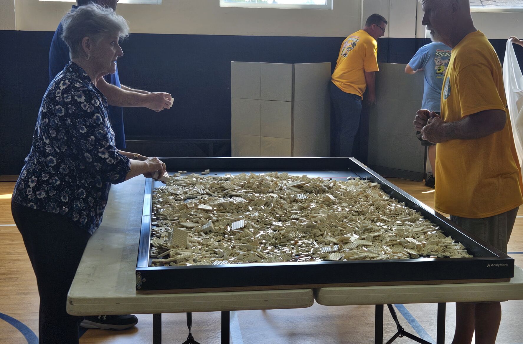 Setting up play table | | wvnews.com