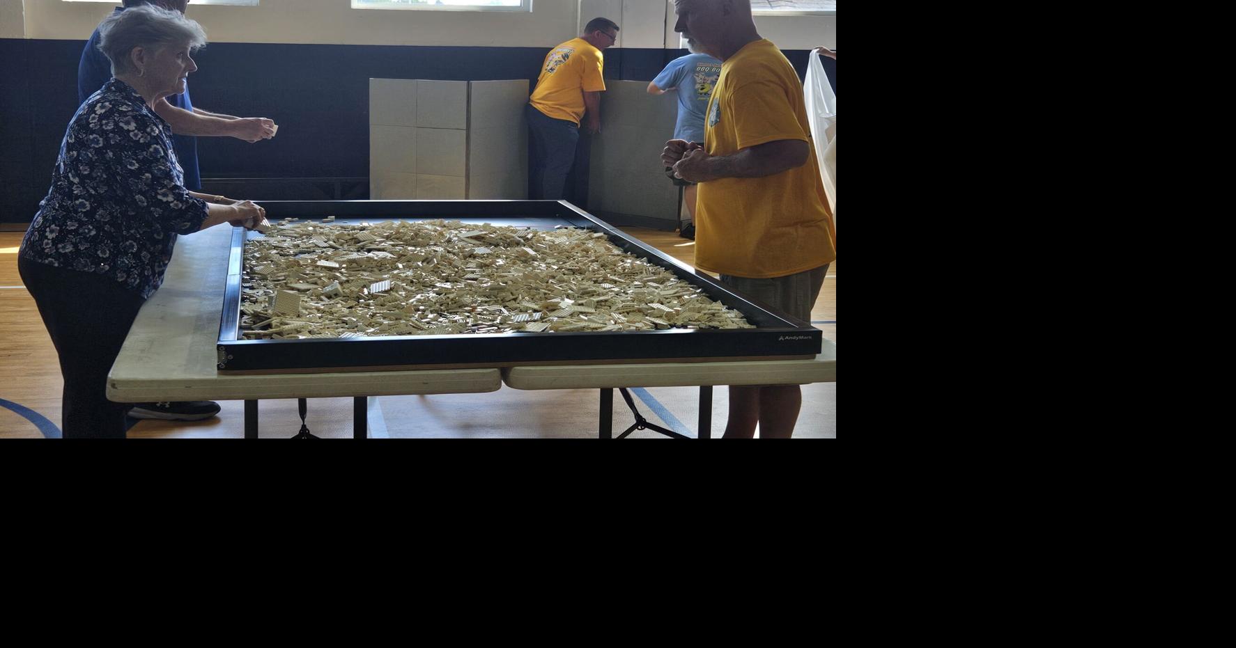 Setting up play table | | wvnews.com