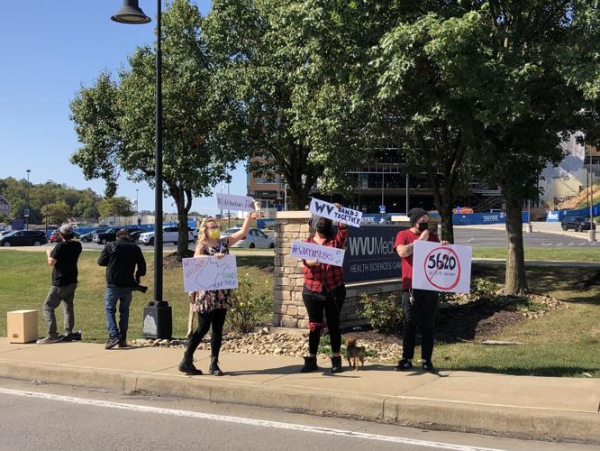 Two dozen march in Morgantown to protest ban on live music performances ...