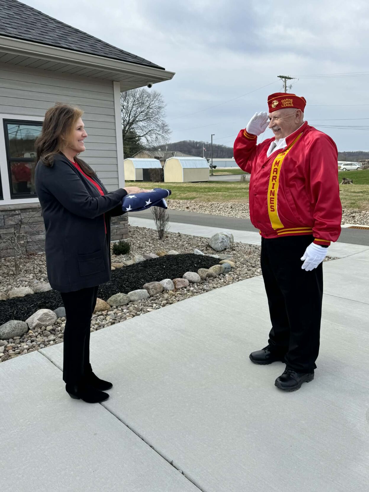 Patriotism on display as flagpole debuts at Home National Bank ...